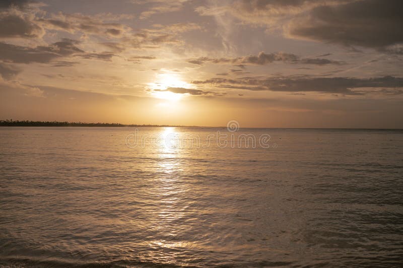 Beautiful View of Sunset and Its Reflection Over Ocean Stock Photo ...