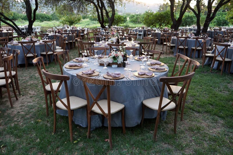 Beautiful View of Tables with Table Cloths with Patterns in the Garden ...