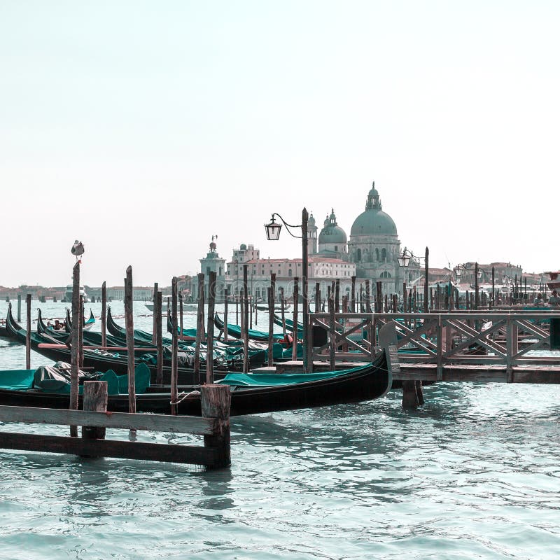 Beautiful View Of Traditional Gondola On Canal Grande With Basilica Di