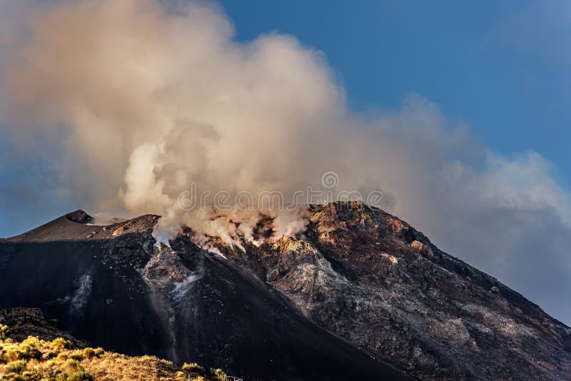 Beautiful View of a Volcano with Smoke Under the Clear Sky Stock Image ...