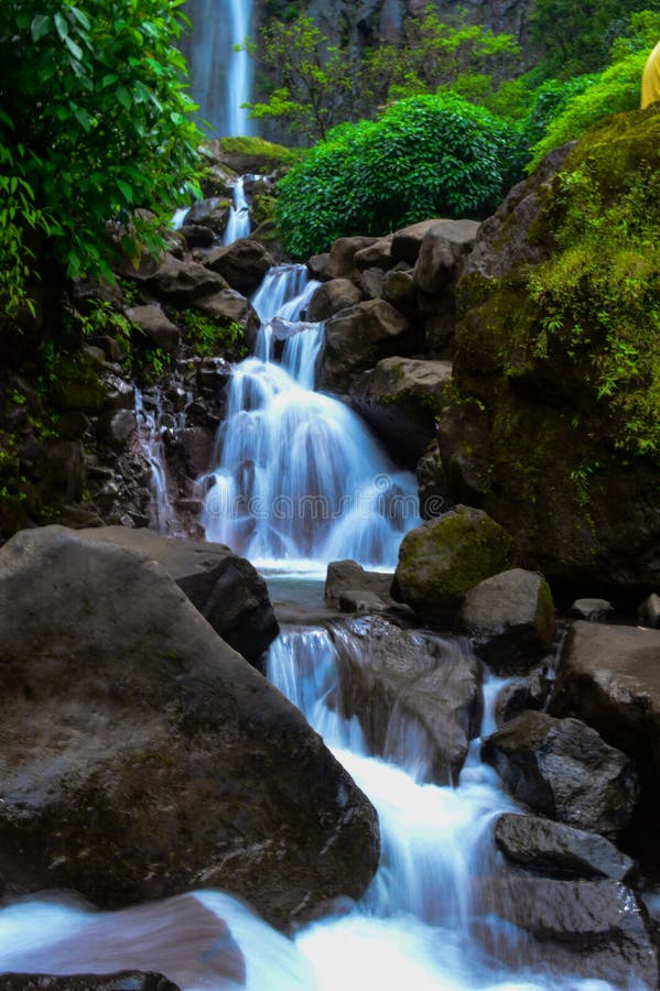 Beautiful View of a Water Flowing Downstream from a Rocky Waterfall ...