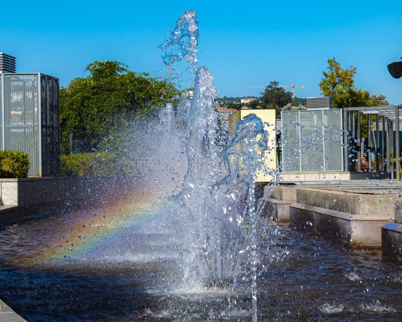 Beautiful View of a Water Fountain in Front of Apartment Buildings ...