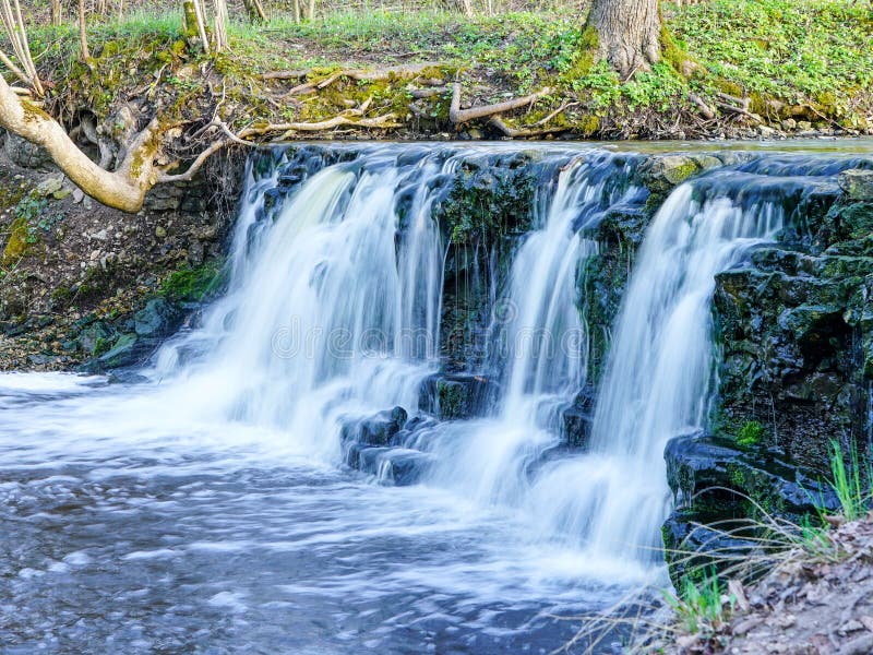 Beautiful View in Spring of a Waterfall in a Small River Stock Photo ...
