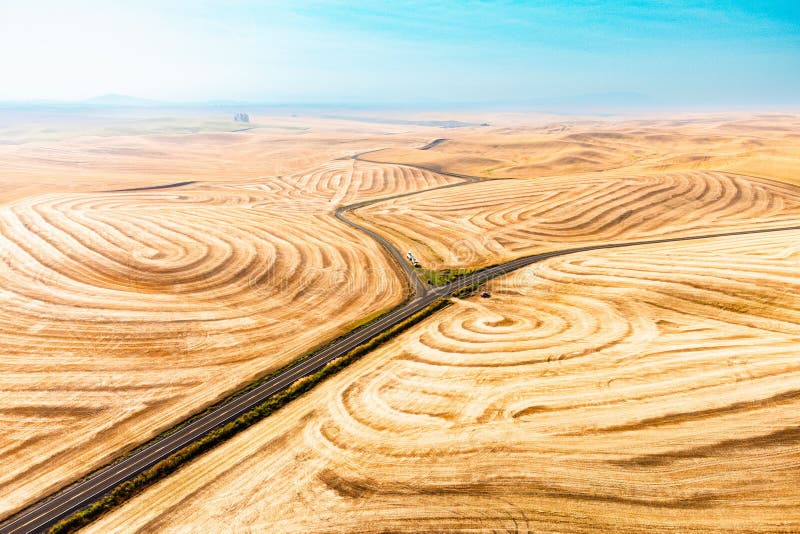 Beautiful View of a Wheat Field with a Rolling Hill Pattern Stock Photo ...