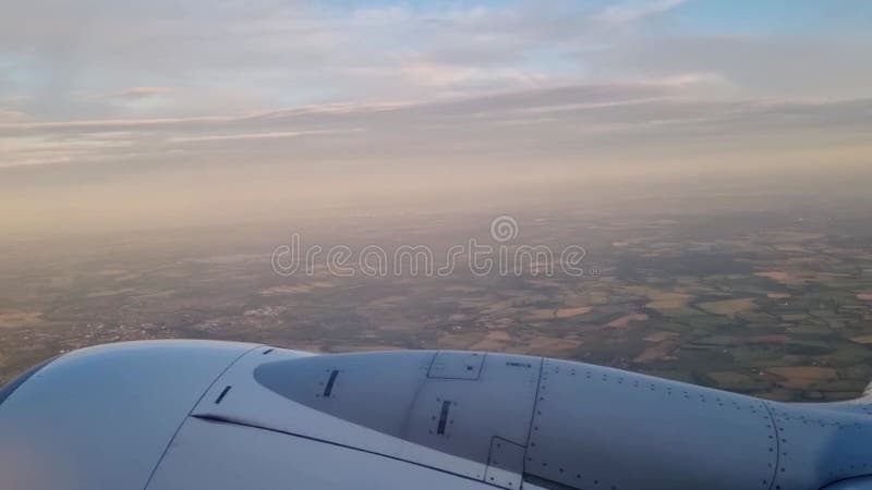 Beautiful View from the Window of a Flying Plane on the Ground and ...