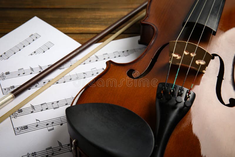 Beautiful Violin, Bow and Note Sheets on Table, Closeup Stock Photo ...