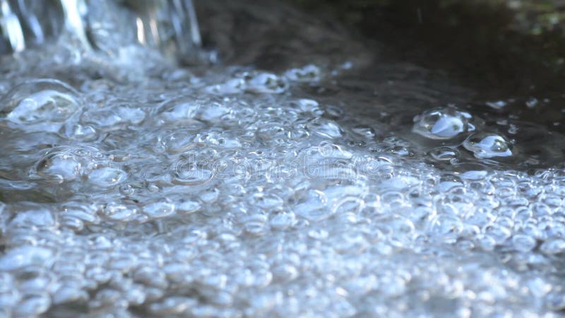 Beautiful Water Bubbles in Natural Spring Water. Close Up. Stock ...