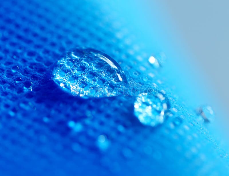 Beautiful Water Drops Photographed Close Up on a Blue Background Stock ...