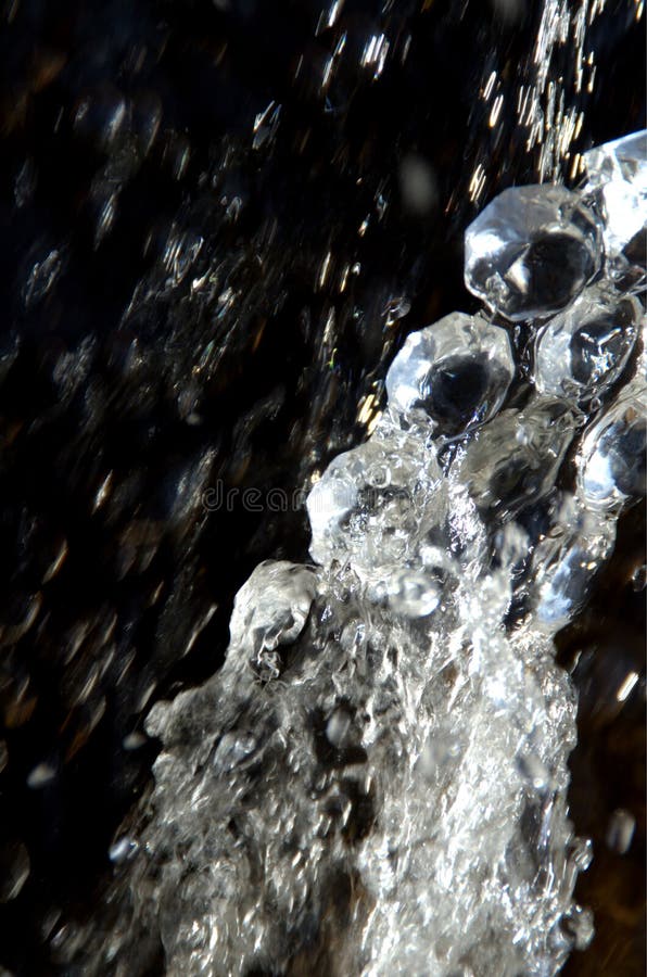 Beautiful Water with Real Crystals Flowing in Drops. Stock Photo ...
