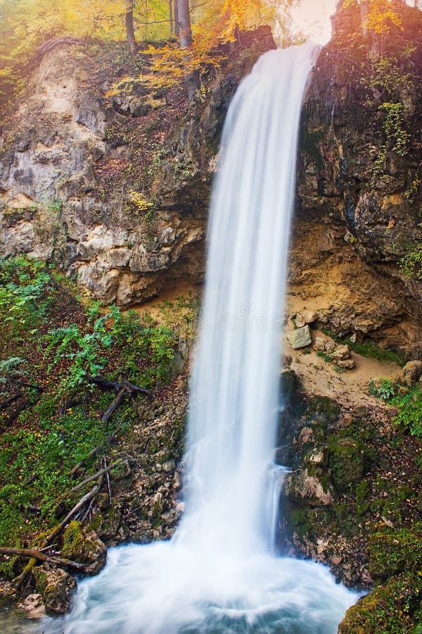 Beautiful Waterfall on an Autumn Covered Mountain Side Stock Image ...