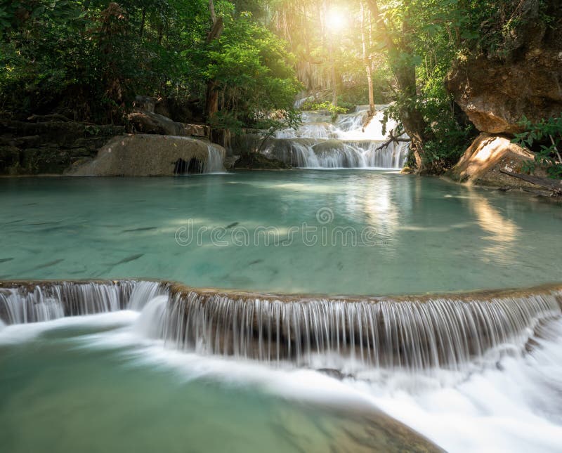 A Beautiful Waterfall Deep in the Tropical Forest Stock Image - Image ...