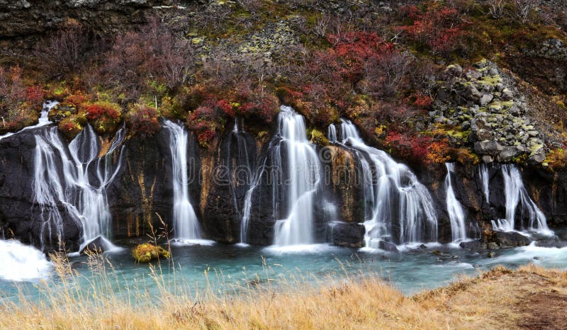 Beautiful Waterfall Dropping from a Mountain with Fall Foliage in ...