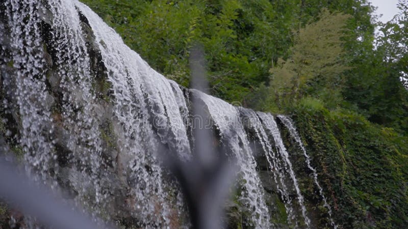 Waterfall Falling from a Mountain Edge Stock Video - Video of dropping ...