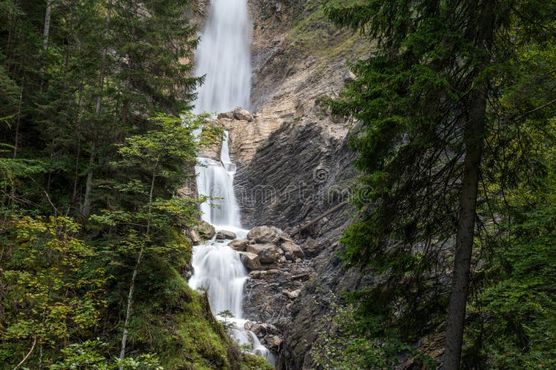 Waterfall Falling through the Stones in the Forest Stock Photo - Image ...