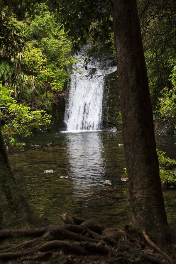 Beautiful Waterfall and Her Reflection on Water Stock Image - Image of ...