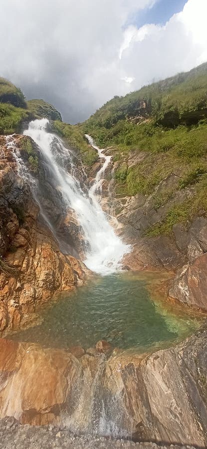 Beautiful Waterfall in the Middle of the Mountains Stock Photo - Image ...