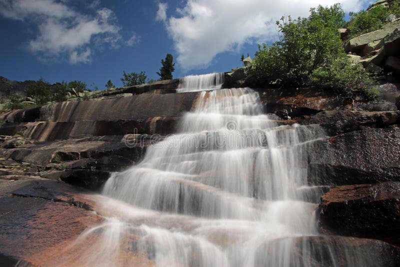 Beautiful Waterfall in the Mountain Range Ergaki, Russia. Stock Image ...