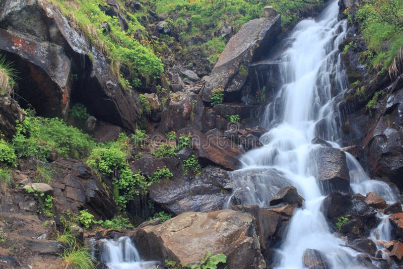 Beautiful Waterfall in the Mountains during the Summer. Stock Image ...