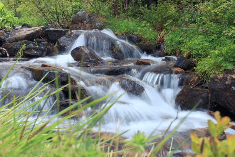 Beautiful Waterfall in the Mountains during the Summer. Stock Photo ...