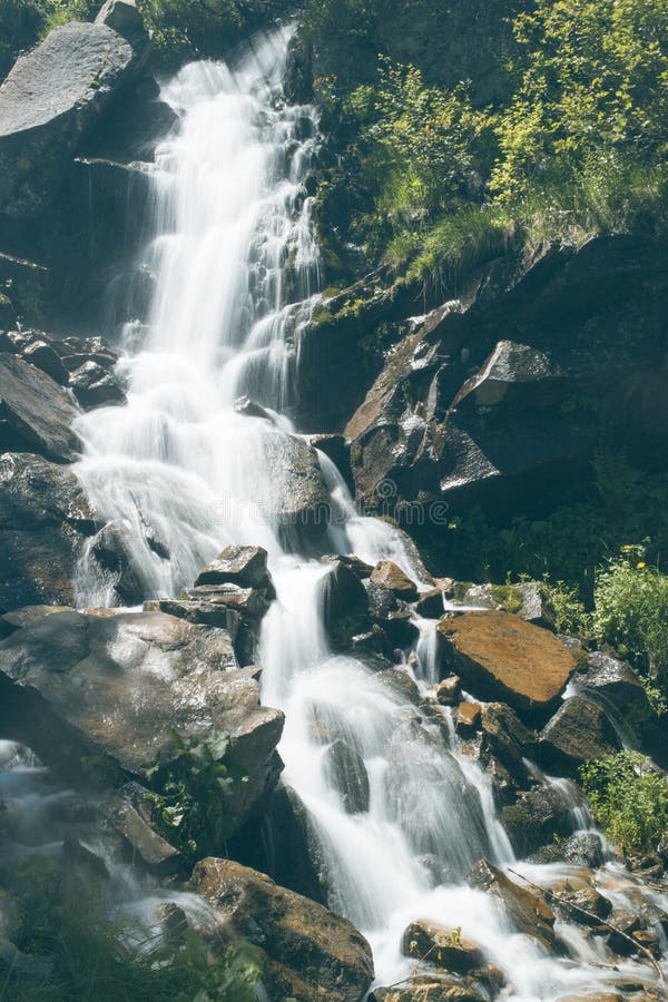 Beautiful Waterfall in the Mountains during the Summer. Stock Image ...