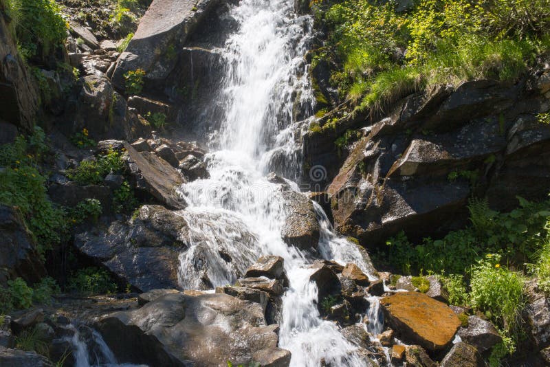 Beautiful Waterfall in the Mountains during the Summer. Stock Photo ...