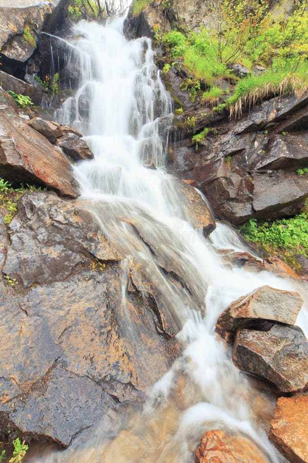 Beautiful Waterfall in the Mountains during the Summer. Stock Image ...