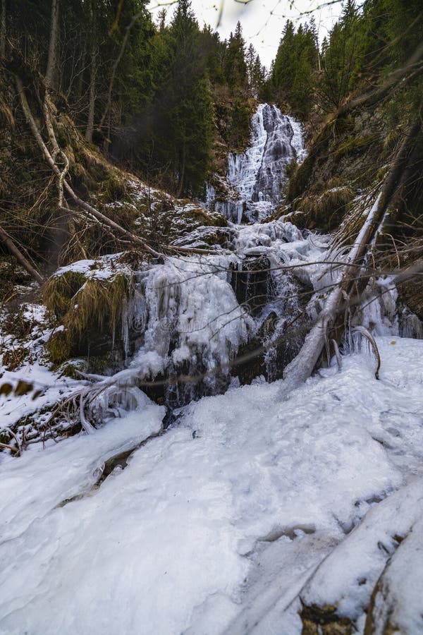 A Beautiful Waterfall in the Mountains during Winter Day Stock Photo ...