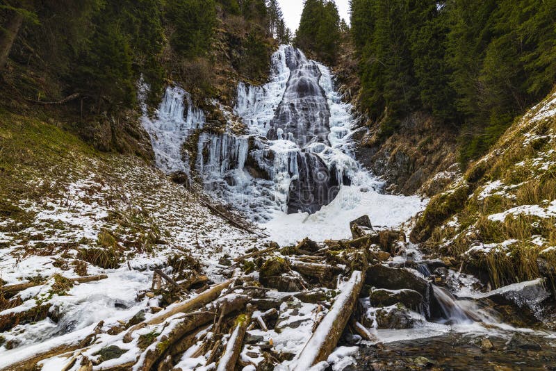 A Beautiful Waterfall in the Mountains during Winter Day Stock Photo ...