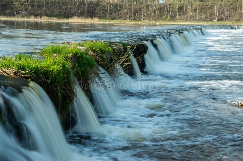 Beautiful Waterfall in the River with Green Grass Stock Photo - Image ...