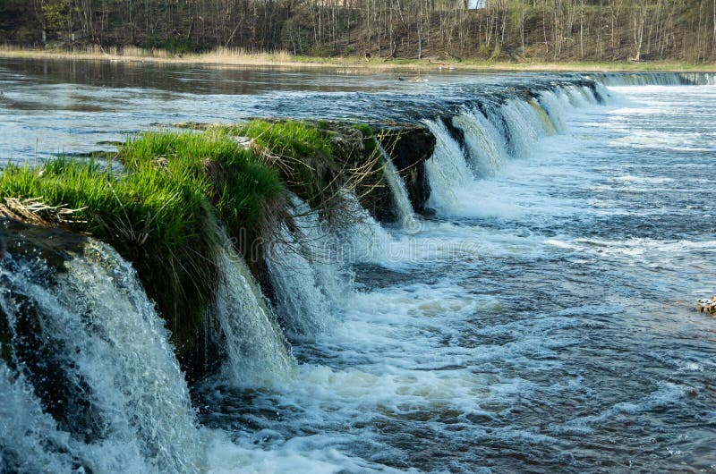 Beautiful Waterfall in the River with Green Grass Stock Photo - Image ...