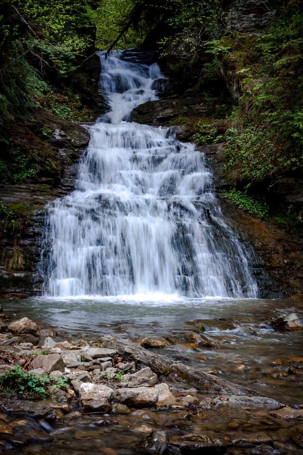 Beautiful Waterfall between Rocks in a Mountain Forest Stock Image ...