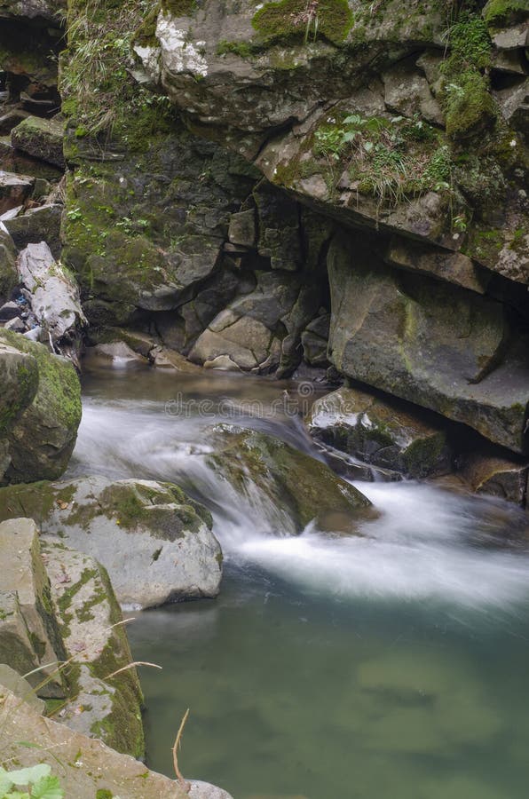Beautiful Waterfall between the Rocks in the Mountain River Stock Image ...