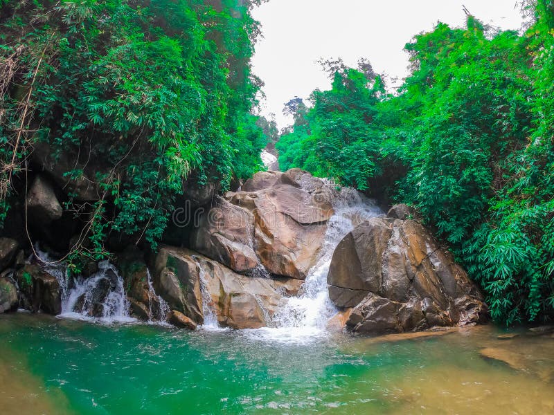 Beautiful Waterfall and Sedimentary Rock on Nature Background Stock ...