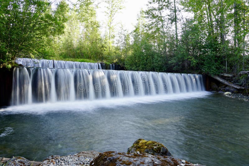 A Beautiful Waterfall with Smooth Reflection Stock Photo - Image of ...