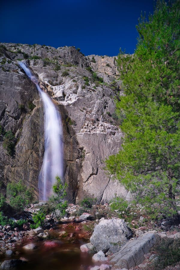 Beautiful Waterfall Streaming Down To a Small Pond Stock Photo - Image ...