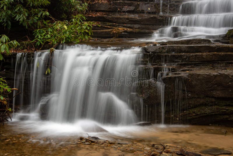 A Beautiful Waterfall in the Woods Stock Image - Image of woods, north ...