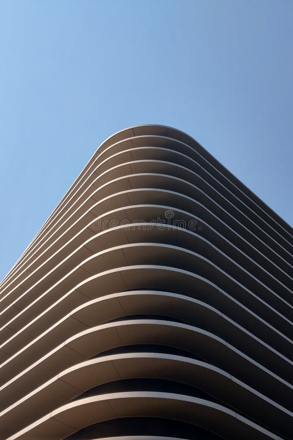 Beautiful Wavy Modern Architecture of the Building Against the Sky ...