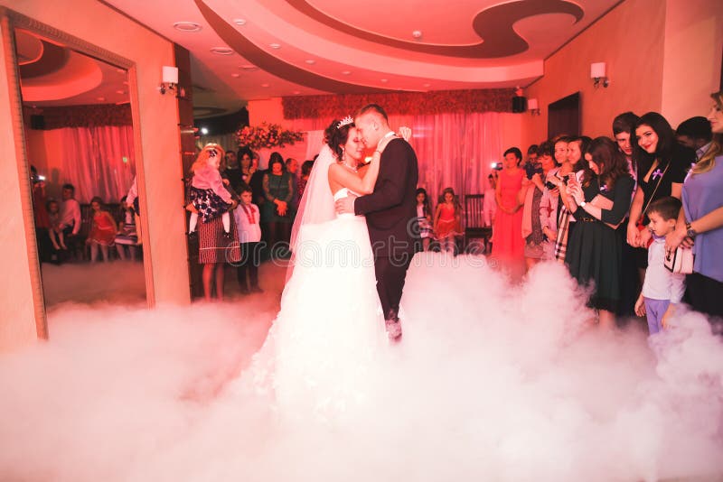 Beautiful Wedding Couple Just Married and Dancing Their First Dance ...