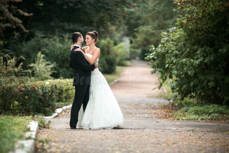Beautiful Wedding Couple Posing Stock Image - Image of married, adult ...