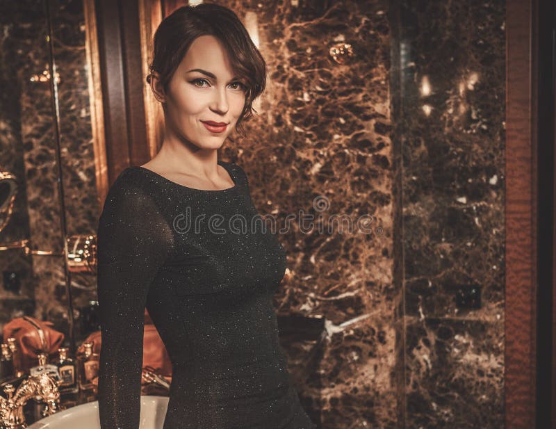 Beautiful Well Dressed Woman Using Laptop and Cellphone Stock Photo ...