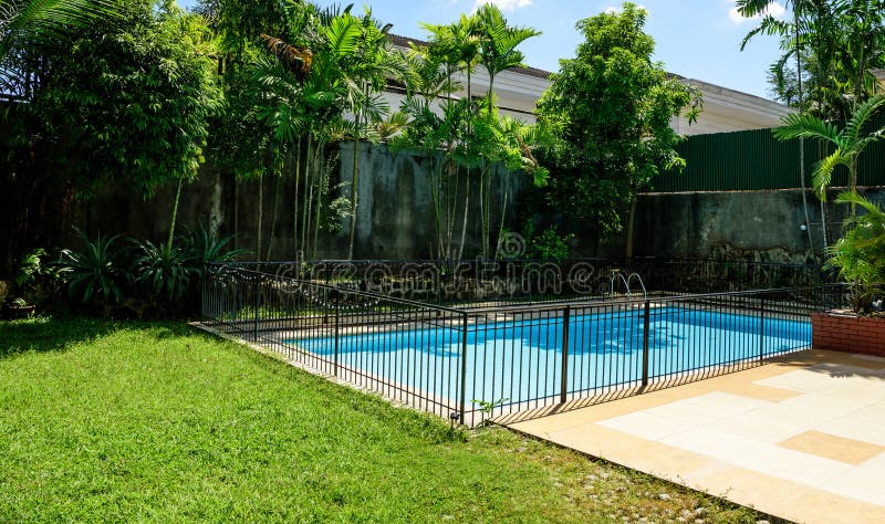 Beautiful Well Maintained Blue Swimming Pool. Stock Image - Image of ...