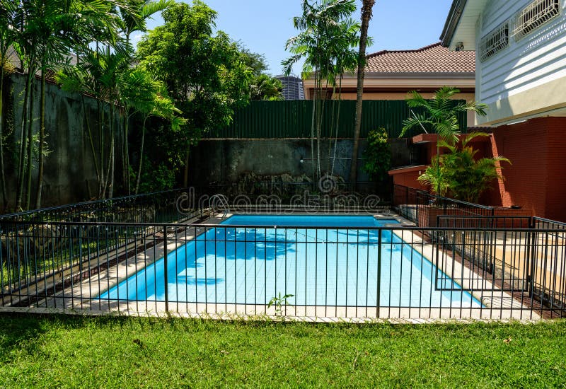 Beautiful Well Maintained Blue Swimming Pool. Stock Photo - Image of ...