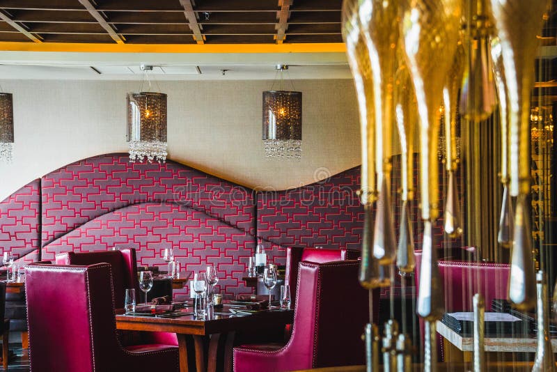 A Beautiful Western Restaurant with Leather Armchairs Beautiful Table ...