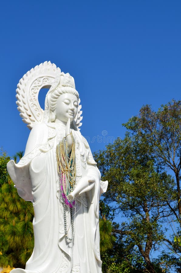 Guan Yin. a Beautiful Guan Yin, Goddess of Mercy with 18 Arms and Pearl ...