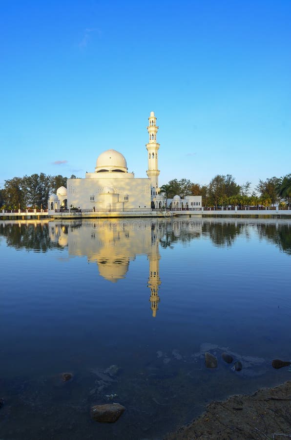 Beautiful White Mosque with Reflection in the Lake during Clean Stock ...