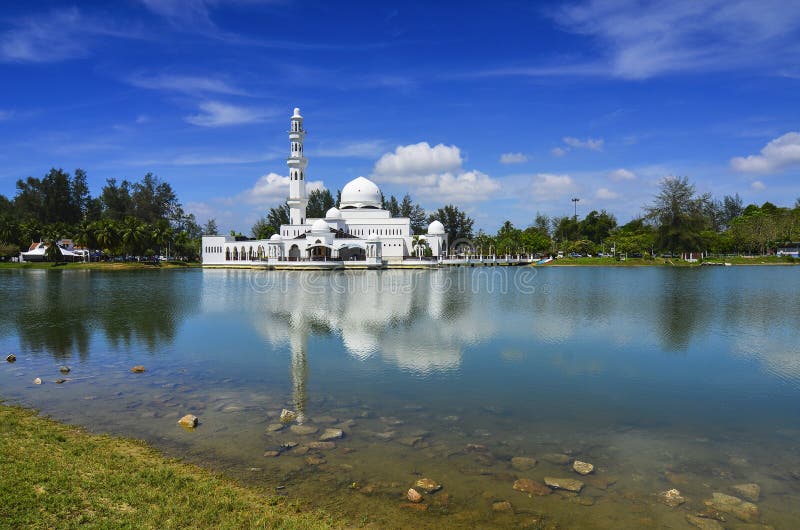 Beautiful White Mosque with Reflection in the Lake during Clean Blue ...