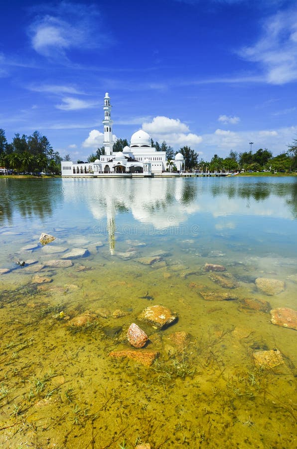 Beautiful White Mosque with Reflection in the Lake during Clean Blue ...