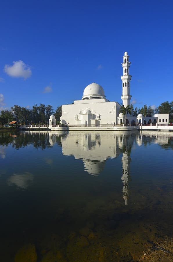 Beautiful White Mosque with Reflection in the Lake during Clean Blue ...