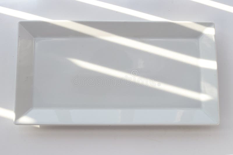 Beautiful White Rectangular Empty Plate on White Table with Deep Shadow ...