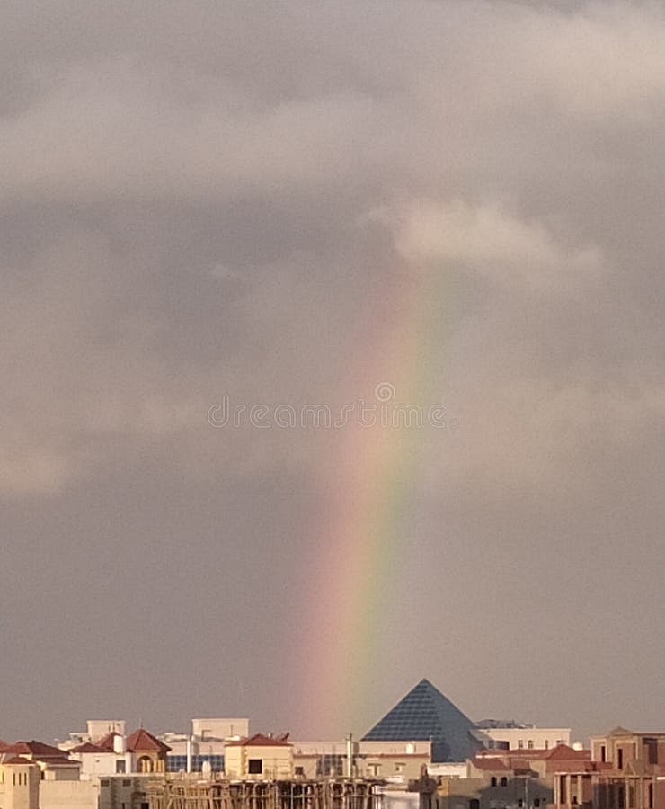 Beautiful Wide Rainbow Over a Pyramid and Houses Stock Image - Image of ...